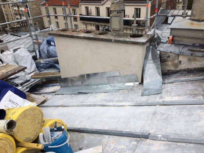 Rénovation des souches de cheminées sur les toits de Paris - Texas Bâtiment
